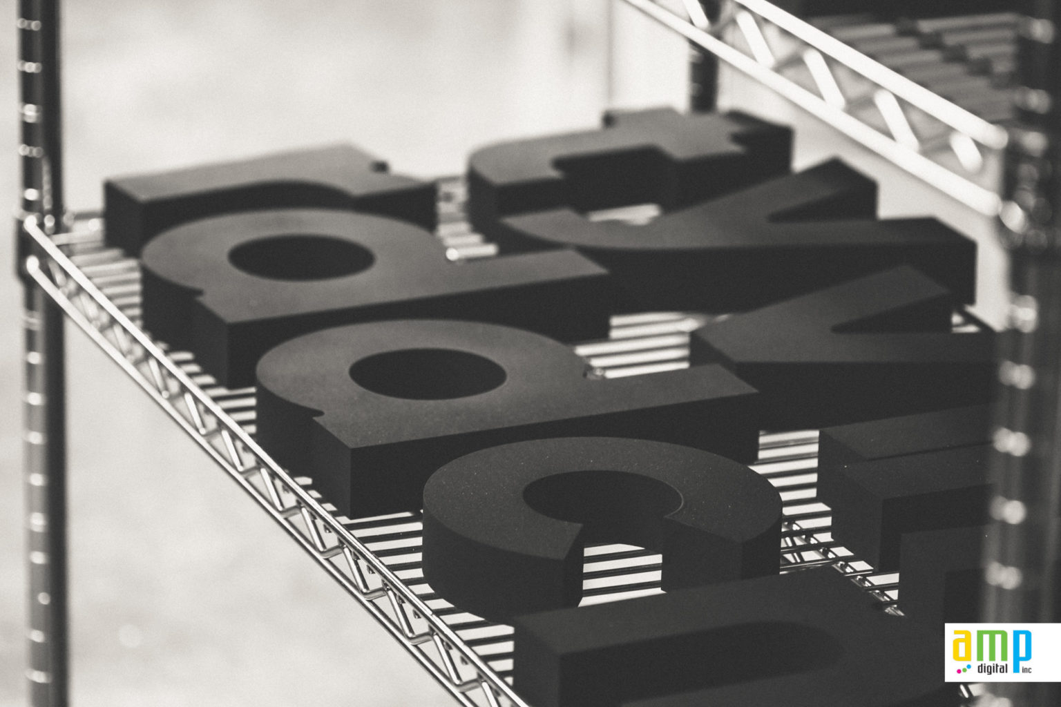 Creation of cut-out letters for signage in SQDC stores - AMP Digital Inc.